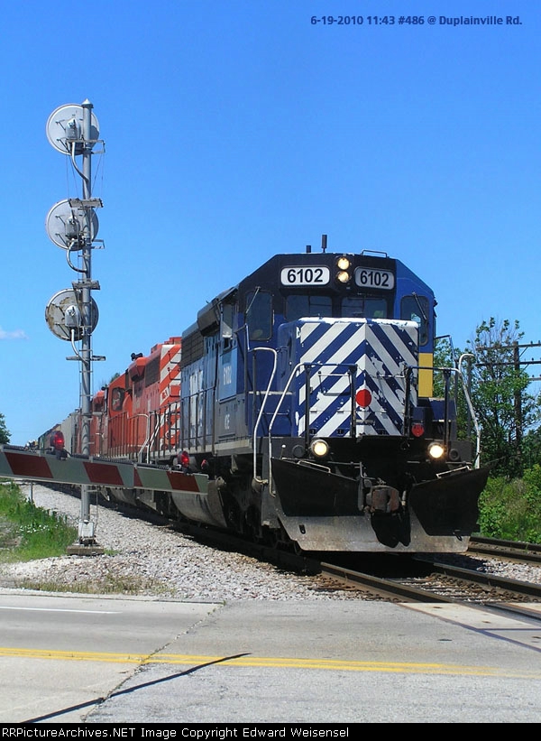 The lone IMRL Sd40-3 that didn't get its ICE uniform leads Cp486 east over Dupy Road